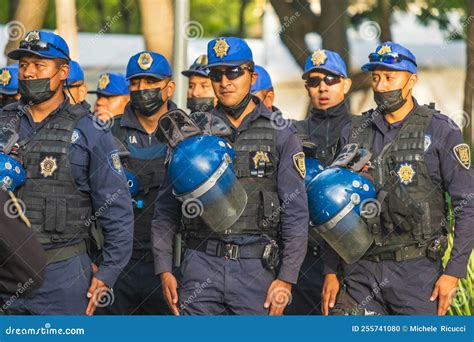 Police Team Standing At Police Car Police Officers Aiming Guns Behind Vehicle Royalty Free