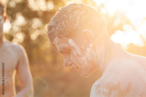 Golden Sunlight Rays Over Profile Of Teenaged First Nations Australian