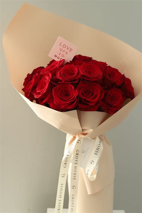 Radiant Red Roses Wrapped Bouquet Deluxe And Premium Sizes Fresh