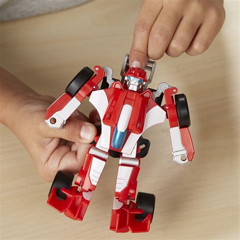 New Rescue Bots Figures Of Optimus And Heatwave With Images And
