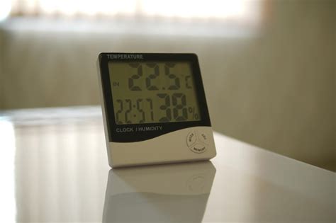 Premium Photo A Digital Clock And Signal Temperature