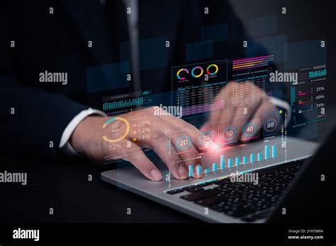 Businessman Analyzing Data On A Virtual Screen With Charts And Graphs Perfect For Data Analysis