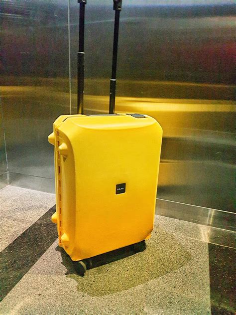 Jakarta Indonesia In October 2022 A Voja Type Lojel Suitcase With Small Size And Yellow Color