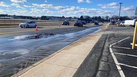 Water Main Break Disrupts Traffic On Airport Road