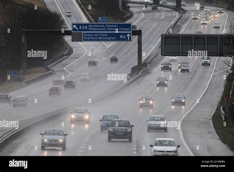 M6 Motorway In Cheshire Junction 18 In Rainy Conditions Causing Spray
