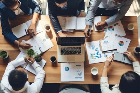 Asian Business Team Collaborates In Project Brainstorm Meeting Premium Ai Generated Image