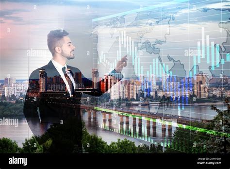 Multiple Exposure Of Businessman Graph And Cityscape Stock Photo Alamy