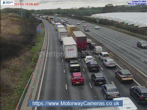 Lorry Driver Taken To Hospital After Crashing Into Embankment On M6
