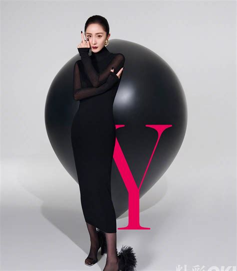 杨幂低盘发造型演绎摩登女郎 穿黑丝高跟鞋秀美腿 搜狐大视野 搜狐新闻