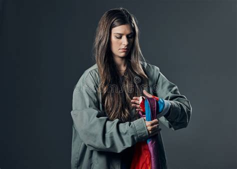 Protest Lgbtq And Woman With Flag In Studio Wrapping It On Hand For
