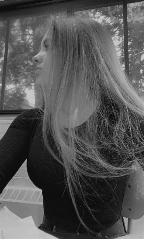 Blonde In Black Top With Boob Outline Pic