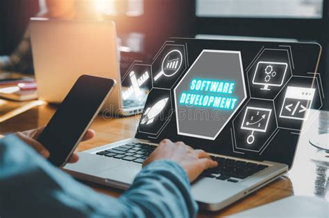 Person Working On Laptop Computer With Software Development Icon On
