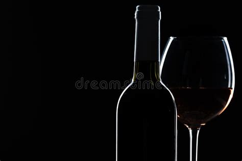 Wine Bottle And Wine Glass In A Black Background Stock Image Image Of