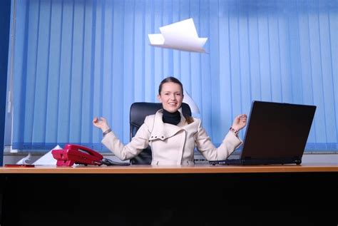 Premium Photo Happy Businesswoman Throwing Papers In Air