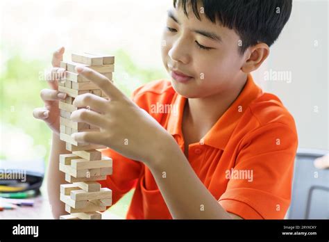 Asian Father And Son Playing Wood Blocks Game Carefree Kid Playing Wood Blocks Game Building