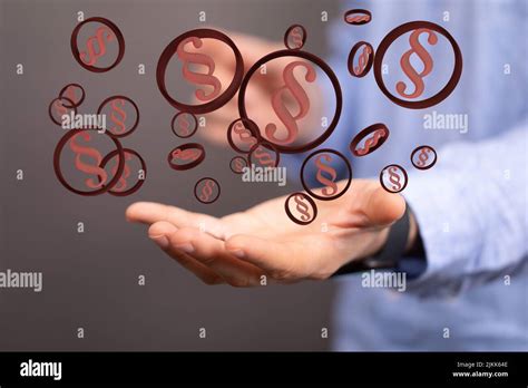 A 3d Rendering Of Section Signs Hovering Over A Persons Palm Law And