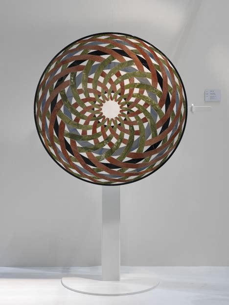 Optical Illusions Created By Spinning Marble Disks