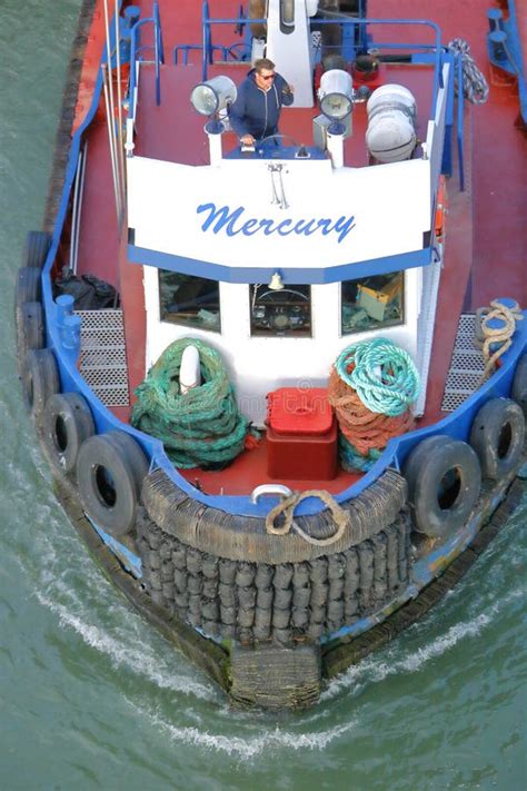 Tug Boat Captain On Deck With Radio Receiver Editorial Photography