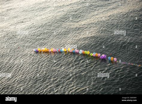Balloon On A String On Water For Shooting Game Stock Photo Alamy
