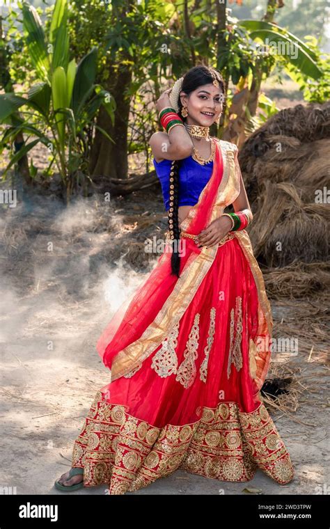 Indian Rural Girl Smiling And Enjoying Nature Freedom Concept Stock