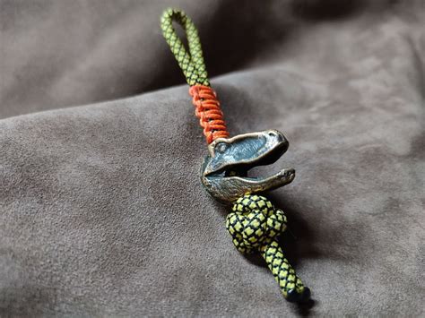 Темляк брелок для ножа Ящер из паракорда аксессуар для ножа купить с доставкой по выгодным