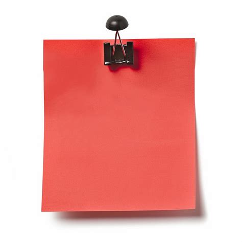 Premium Photo A Red Note Attached To A Clipboard With A Red Clip On It