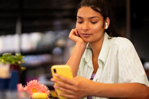 Free Photo Medium Shot Woman Holding Smartphone