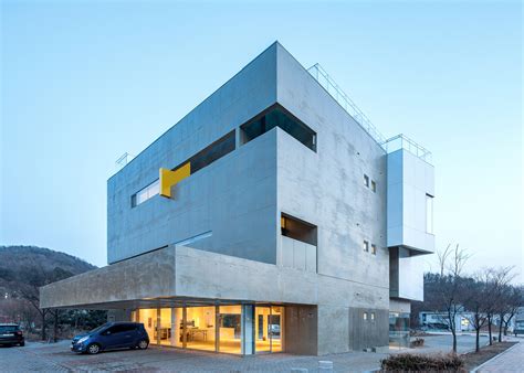 Maxcube Houses Creative Workspaces Within Concrete Walls