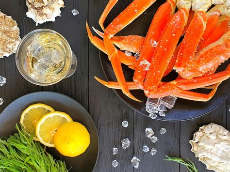 Premium Photo There Are Fresh Crabs On The Table In A Plate And There