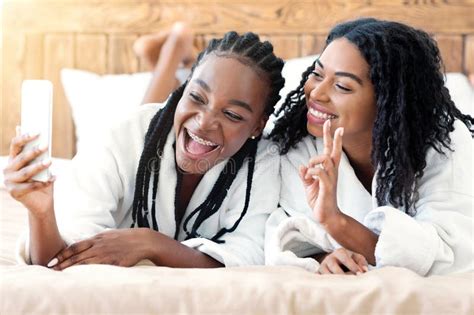 Two Attractive Black Ladies Taking Selfie In Bed Stock Image Image Of