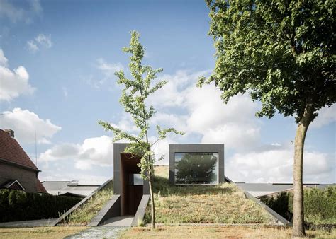 Sloped Green Roof Covers Split Level Home