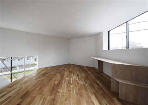 Windows Spiral Towards Roof Of House By Alphaville Architects