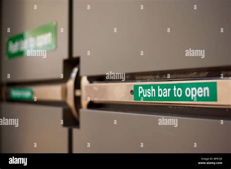 Closed Push Bar To Open Emergency Exit Double Doors In The Uk Stock Photo Royalty Free Image