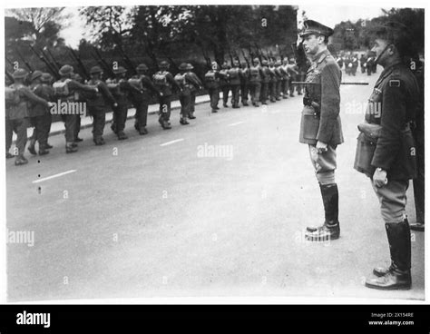 The King Visits The Australian Troops His Majesty Taking The Salute