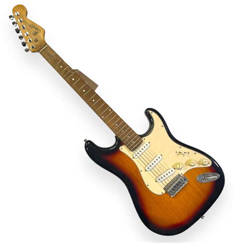 Lot 7 A Fender Squier Stratocaster Electric Guitar