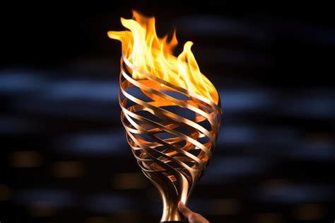 Premium Photo Burning Fire On A Metal Stand On A Black Background