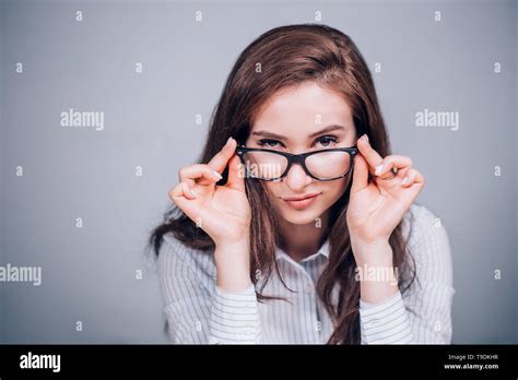 Close Up Portrait Of A Brunette Woman With Glasses Business Lady
