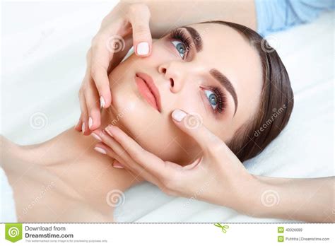 Face Massage Close Up Of A Young Woman Getting Spa Treatment Stock