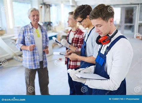 Foreman Explaining Tasks To Workers Stock Image Image Of Professional