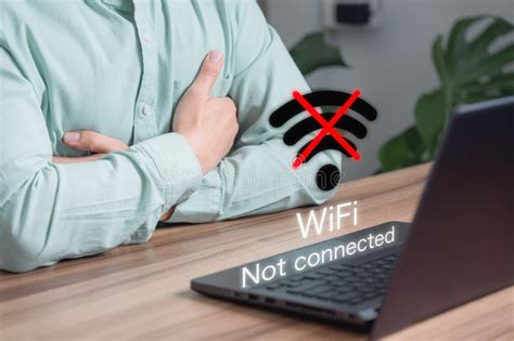 Adult Man Using A Computer Laptop To Connect To Wifi In Office But Wifi Not Connected Stock