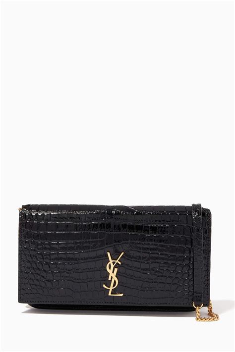 Shop Saint Laurent Black Cassandre Phone Holder With Strap In Shiny