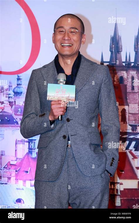 Hong Kong Actor Tony Leung Ka Fai Laughs During A Press Conference For
