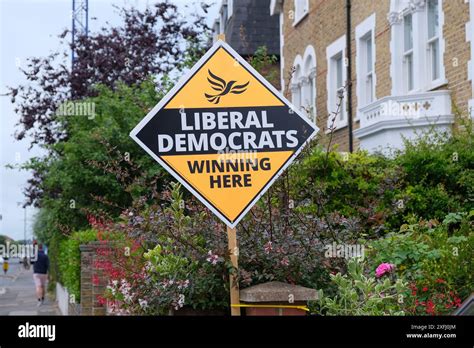 A Liberal Democrats Diamond Poster Board Outside A Home In Wimbledon