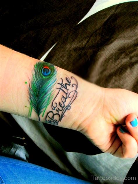 Peacock Feather Tattoo On Wrist Tattoos Designs
