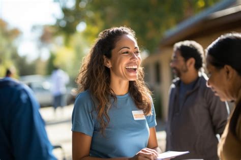 Premium Ai Image A Woman Leading A Community Event Mobilizing Volunteers And Making A Positive