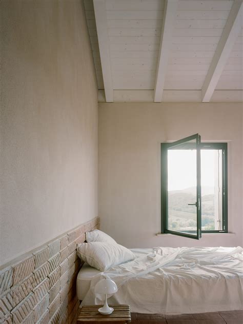 Tuscan Farmhouse Ricupaglia Arranged Around Latticed Brick Wall