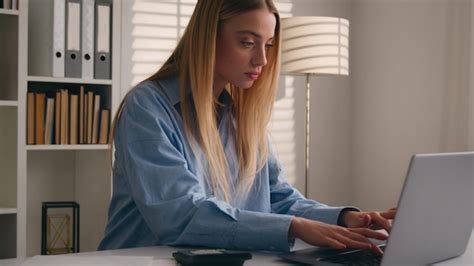 Premium Photo Caucasian Woman Using Calculator Laptop App Calculate Costs Business Incomes