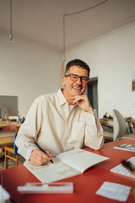Man Posing In Office By Stocksy Contributor Studio Firma Stocksy