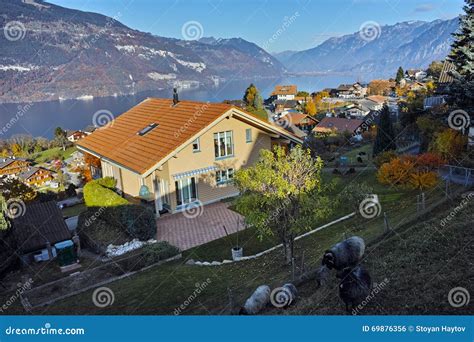 Lake Thun And Typical Switzerland Village Near Town Of Interlaken Stock