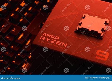 A Close Up Of An Amd Ryzen 9 3900x Processor In A Packaging Box With